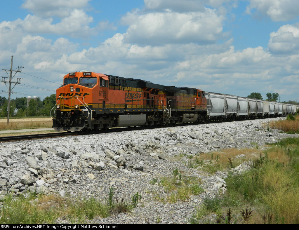Orange Locomotives In The Noon Sun